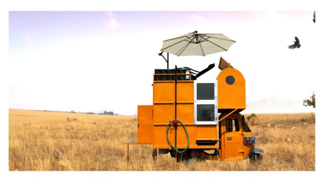 Portable house built on an auto-rickshaw using scrap materials.