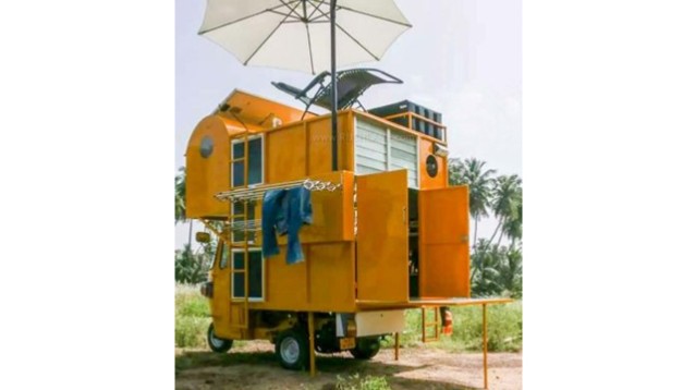 Portable house built on an auto-rickshaw using scrap materials.